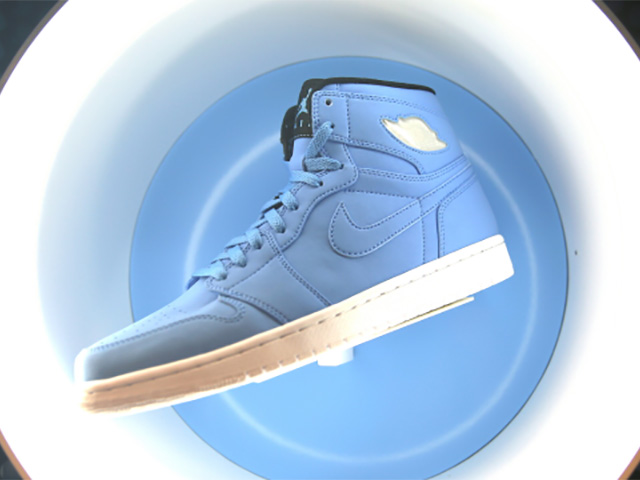 All 31 pairs of "UNC" Jordans on display at the Tar Heel Locker Room - J23